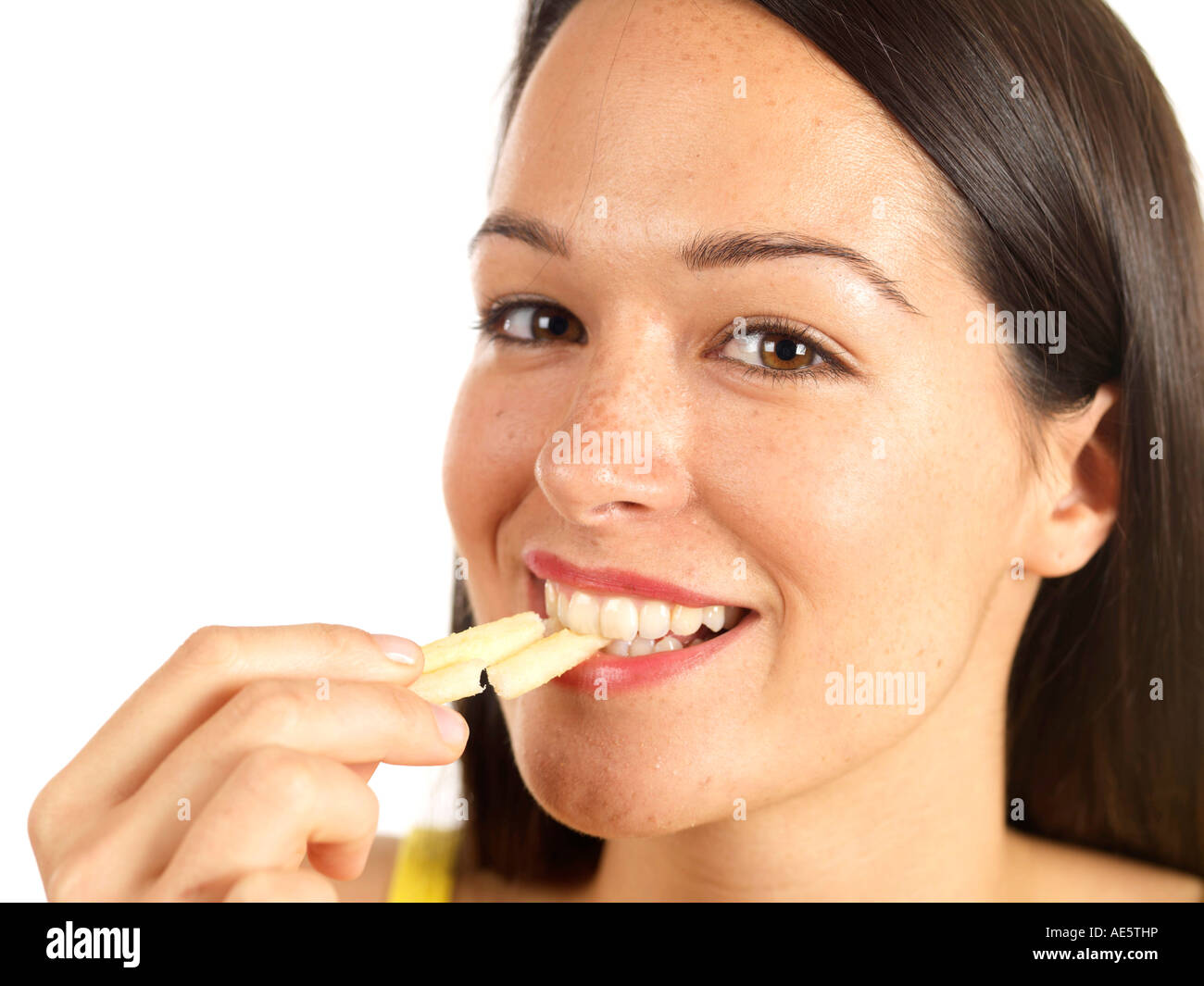 Young woman eating chips fries snack lunch hi-res stock photography and ...