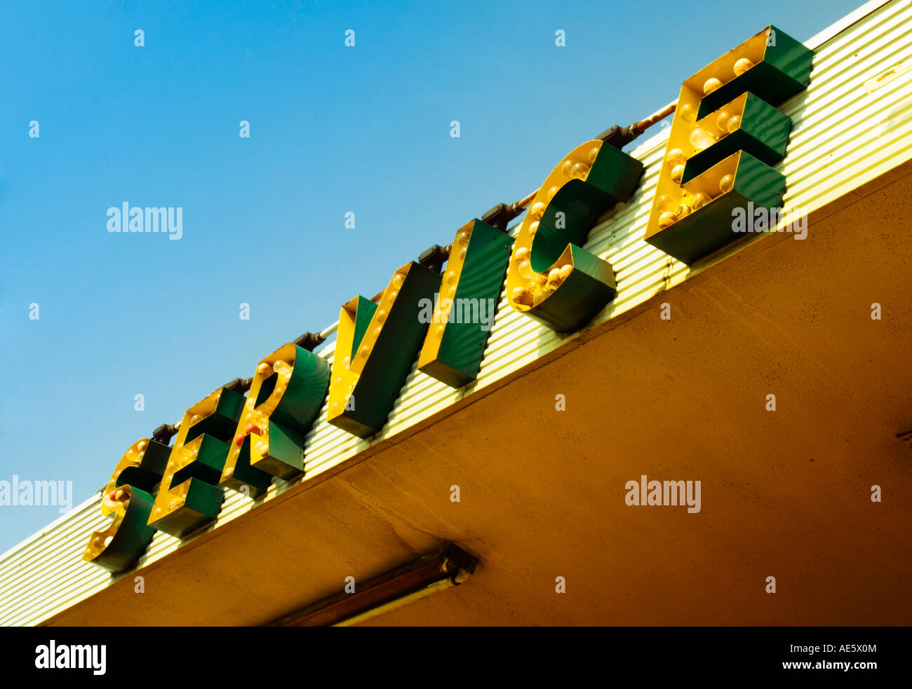 Old dilapidated service sign Stock Photo - Alamy