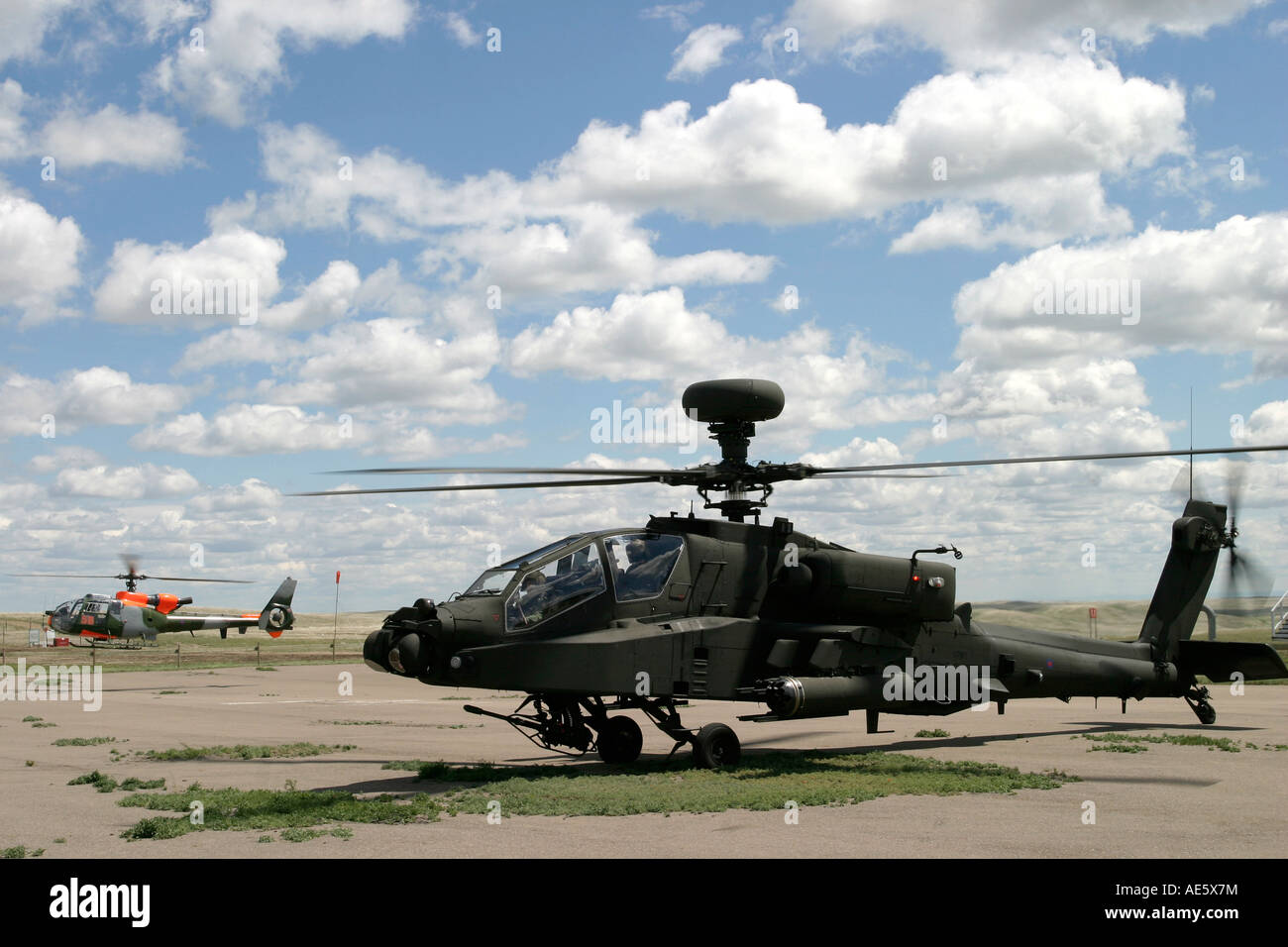 Apache right and Gazelle back left helicopters on the ground Stock ...