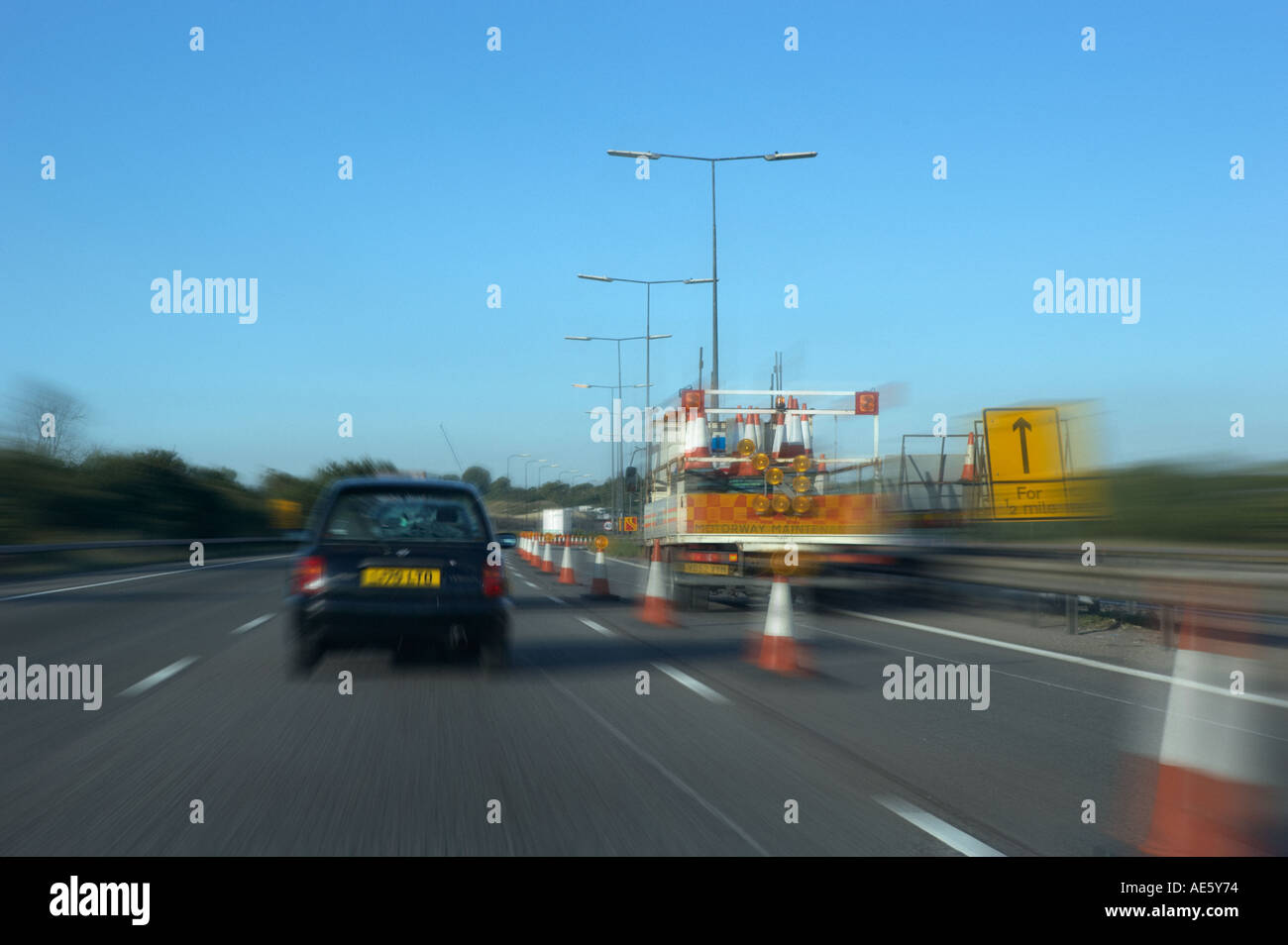 CAR PASSING THROUGH MOTORWAY ROADWORKS Stock Photo - Alamy