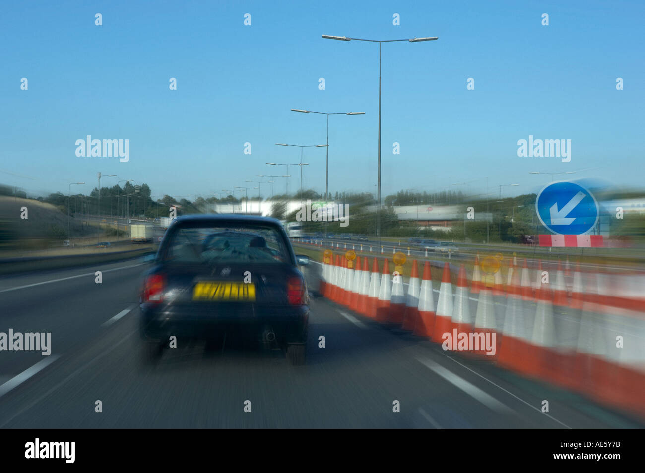 CAR PASSING THROUGH MOTORWAY ROADWORKS Stock Photo - Alamy