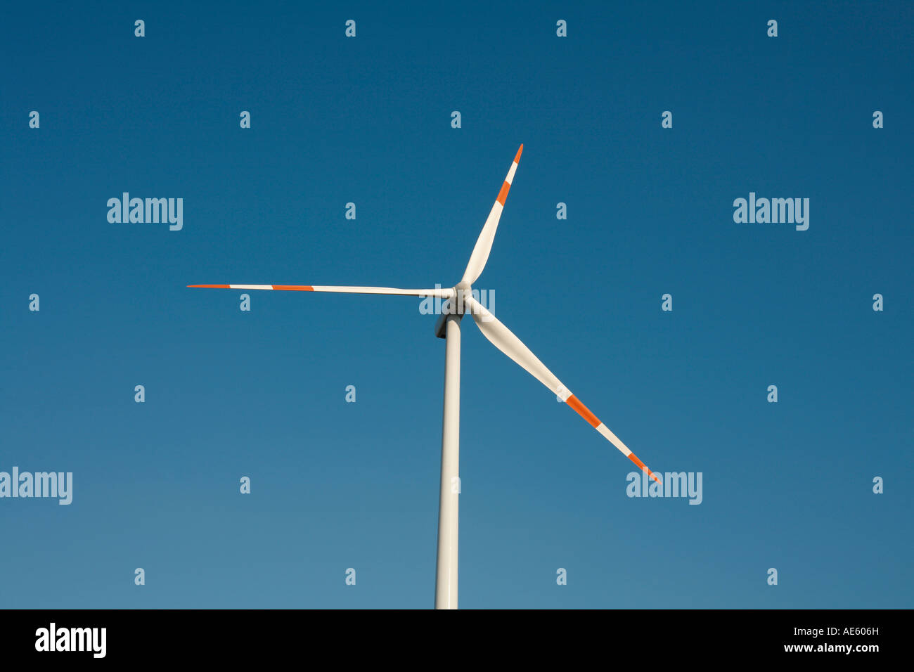 Wind turbine against blue sky - windmill, wind mill Stock Photo - Alamy