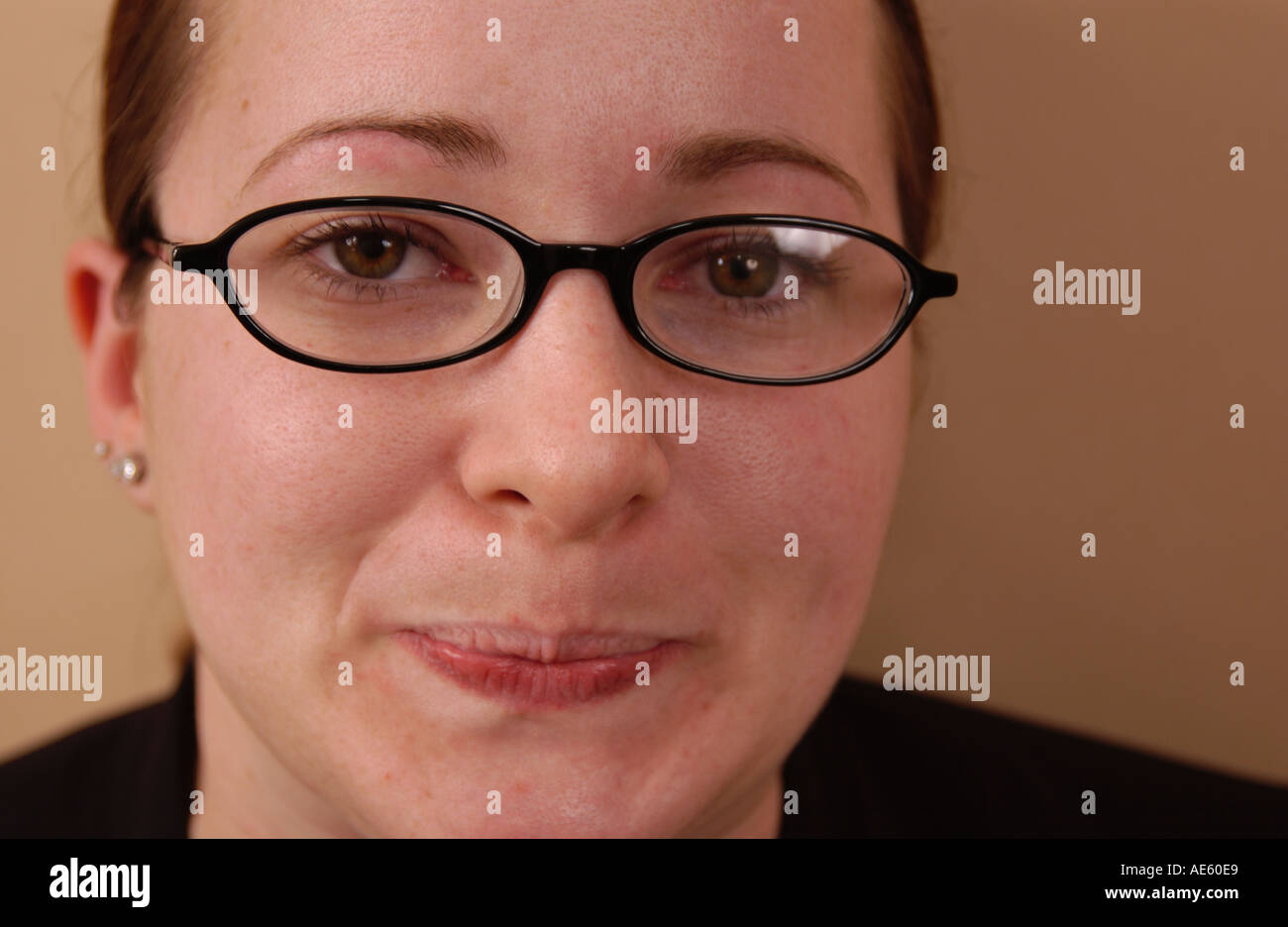 Beautiful Nerd girl with glasses Stock Photo - Alamy