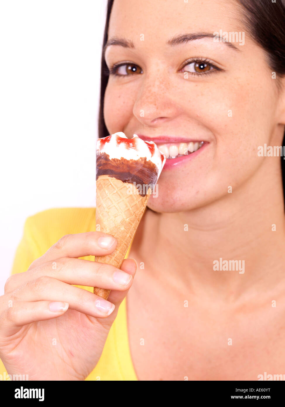 Young woman eating ice cream cornetto strawberry snack hi-res stock ...