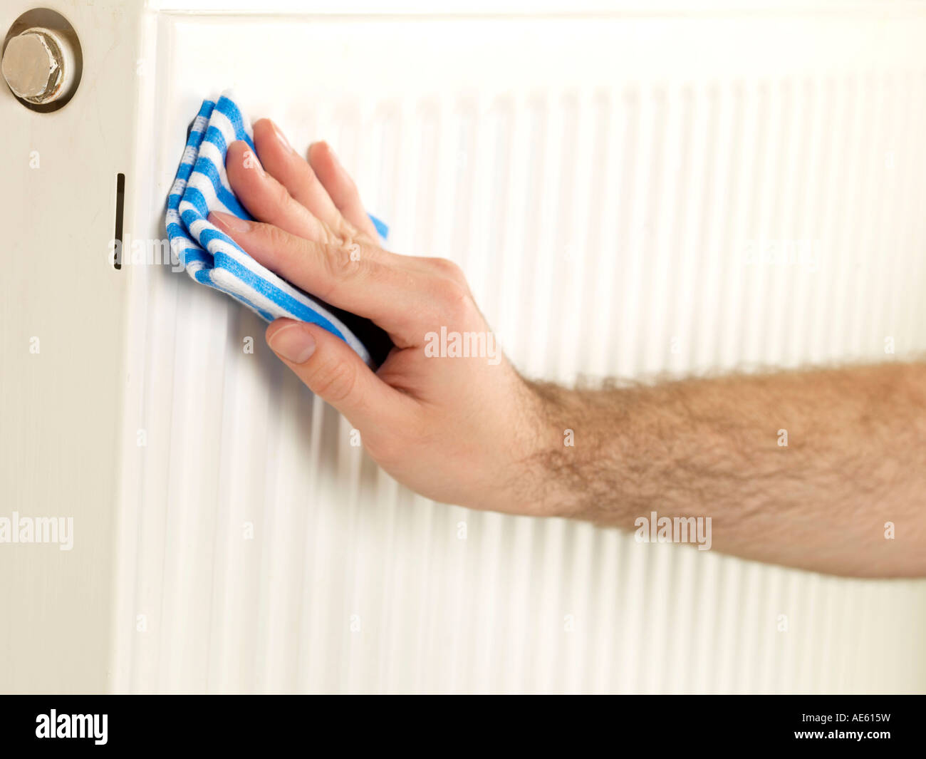Man Wiping Surface Clean Model Released Stock Photo - Alamy