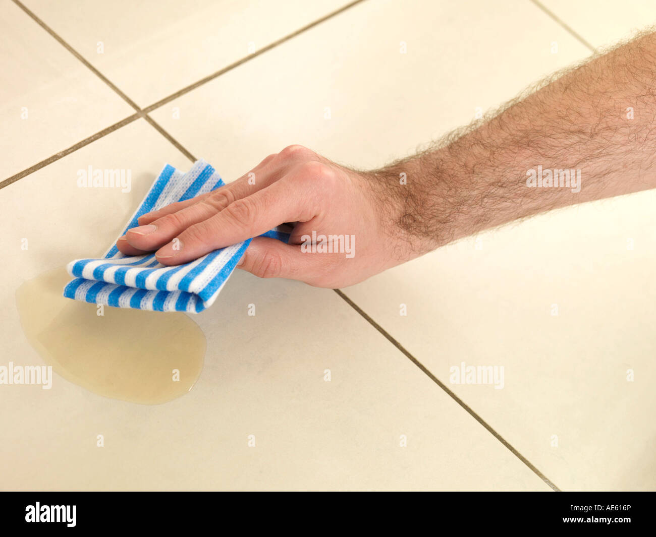 Man Wiping Surface Clean Model Released Stock Photo - Alamy