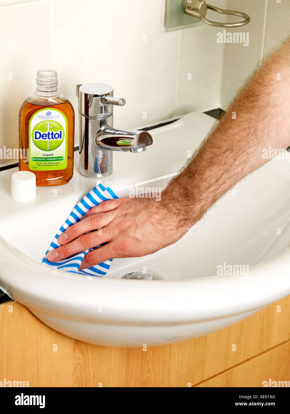 Man Wiping Surface Clean Model Released Stock Photo - Alamy