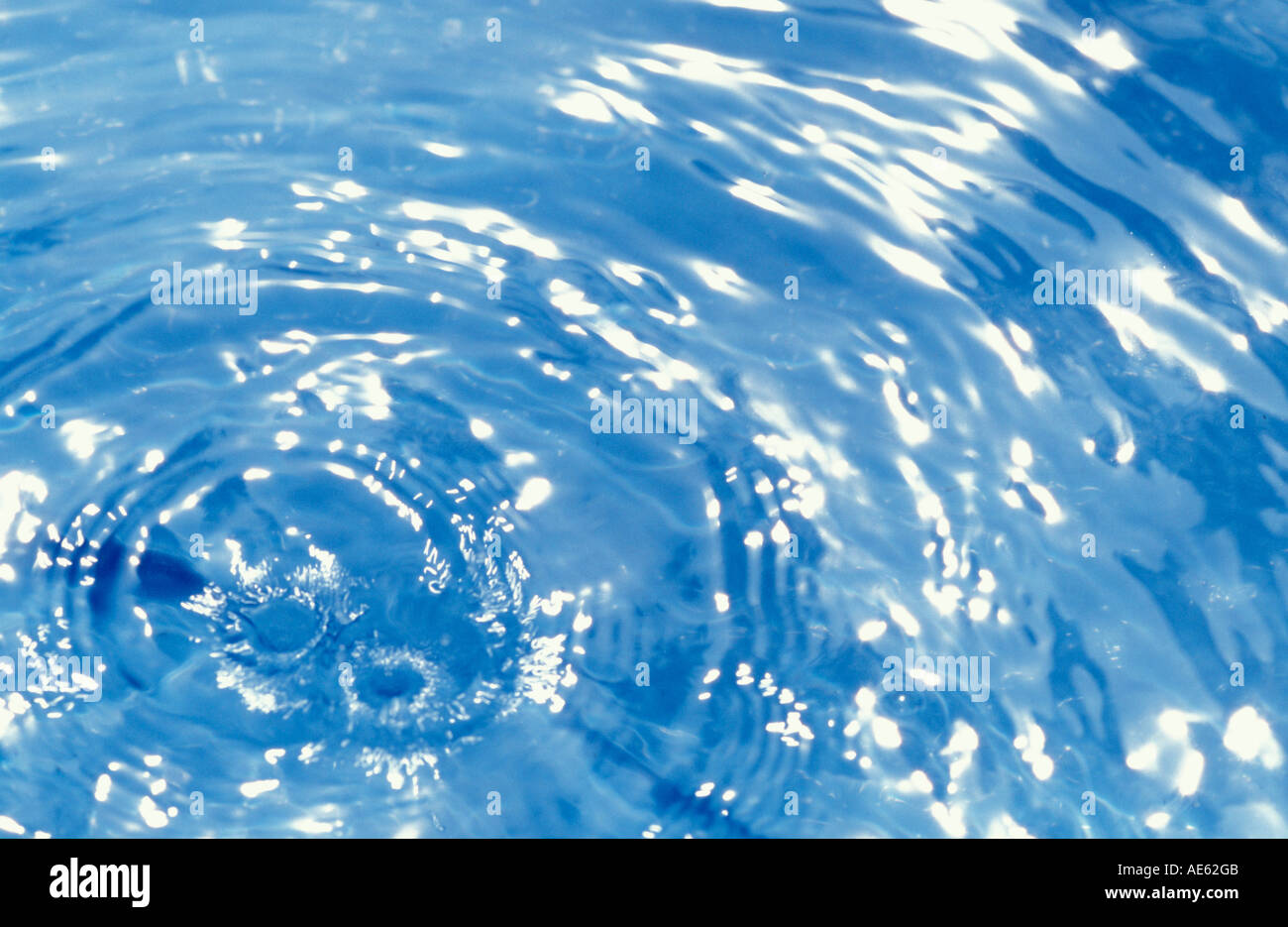 Drop fallen into water Stock Photo - Alamy