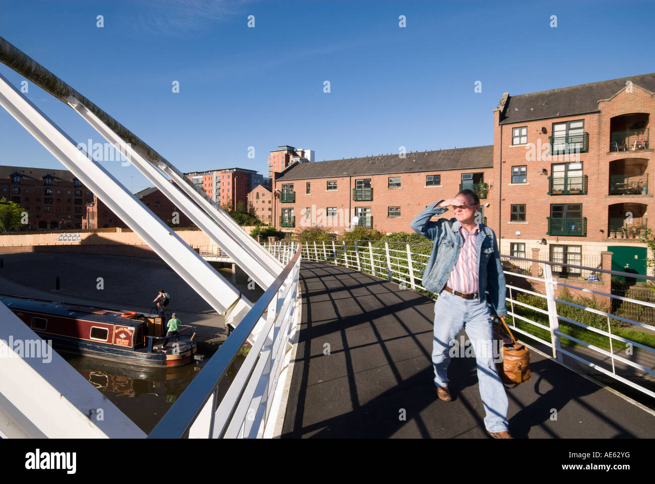 Man on Bridge Castlefield Manchester UK Stock Photo - Alamy