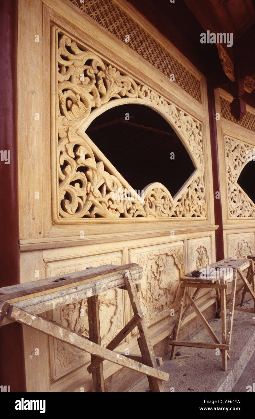 Traditional Chinese wood work underway in the booming tourist town of ...