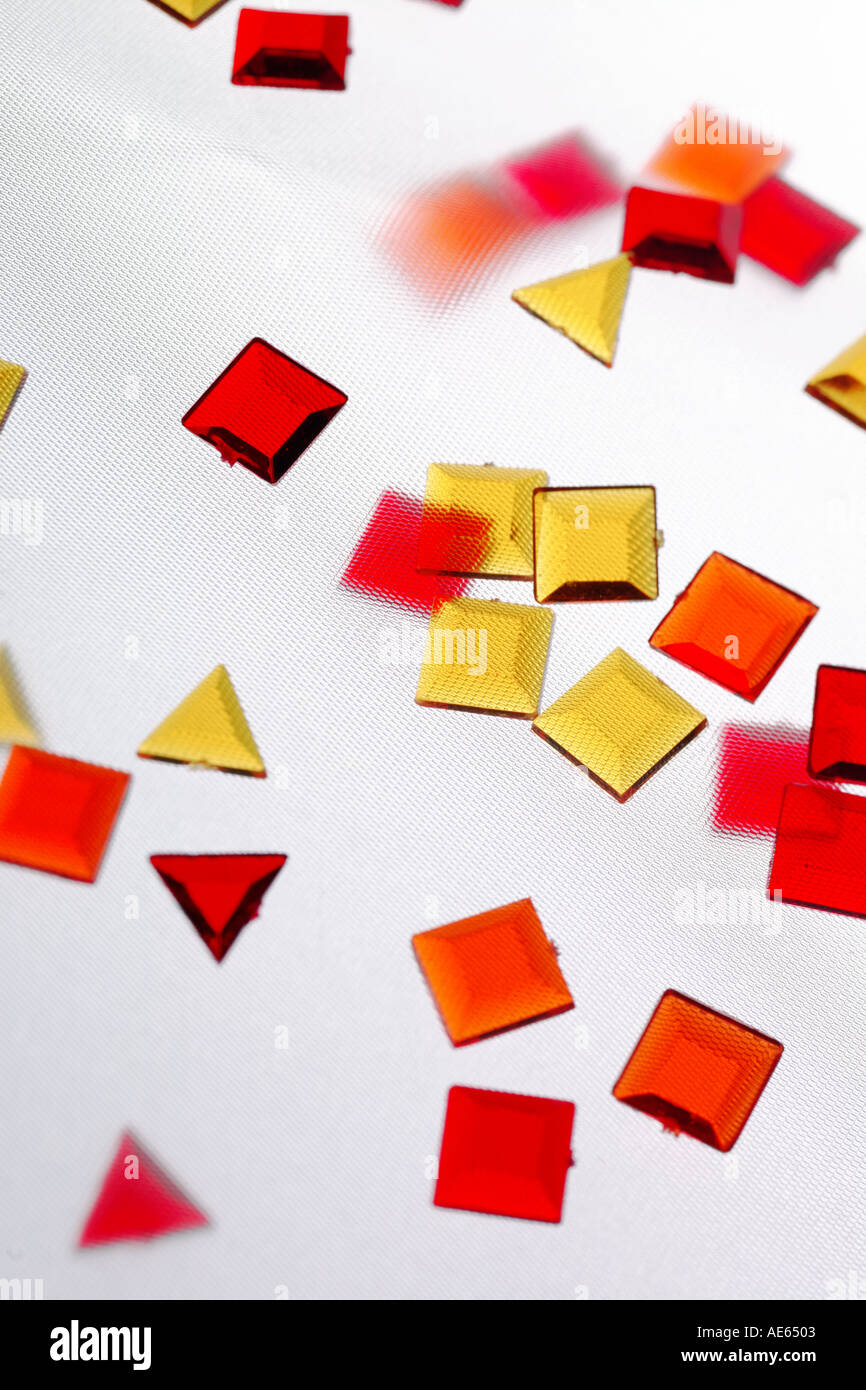 coloured plastic shapes on white background Stock Photo - Alamy