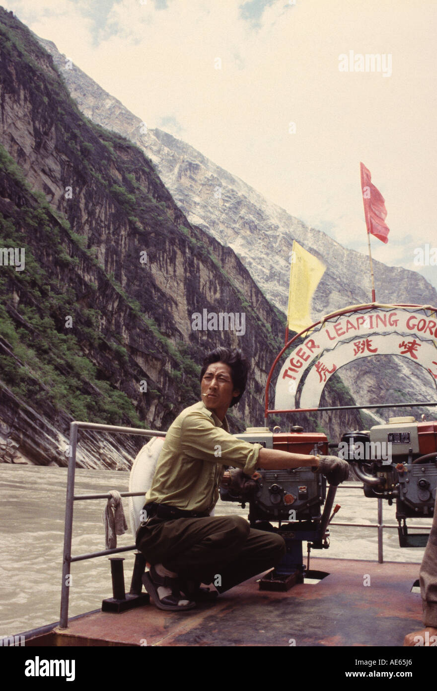 China Yunnan Tiger Leaping Gorge A boatman crosses the treacherous ...