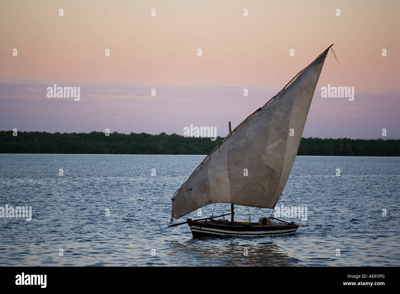A dhow sails into Ibo Island part of the Quirimbas Archipelago ...