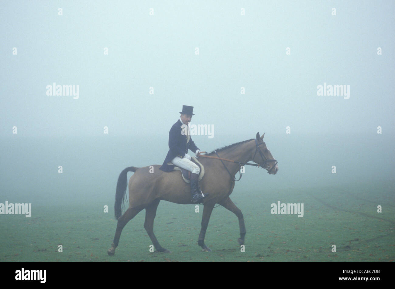 Foxing hunting 1980s UK. Wearing hunt colours Blue and Buff of the Duke ...