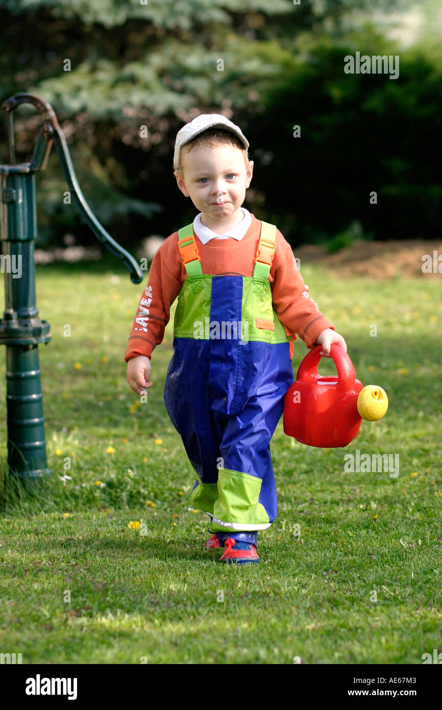 Little boy with a ewer Stock Photo - Alamy