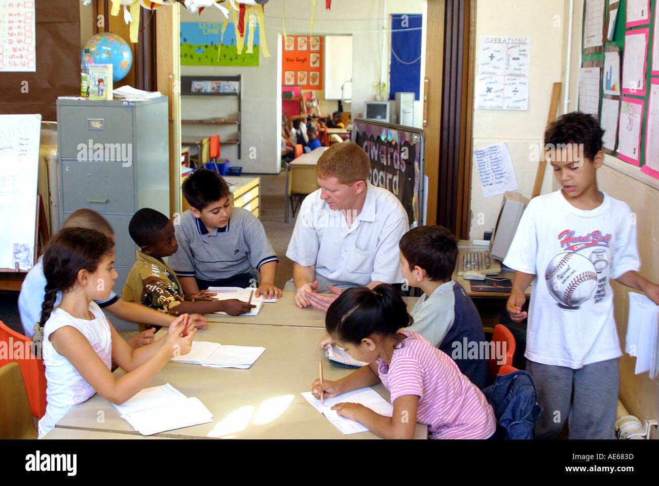 Primary school children 8 year old classroom with teacher Stock Photo ...