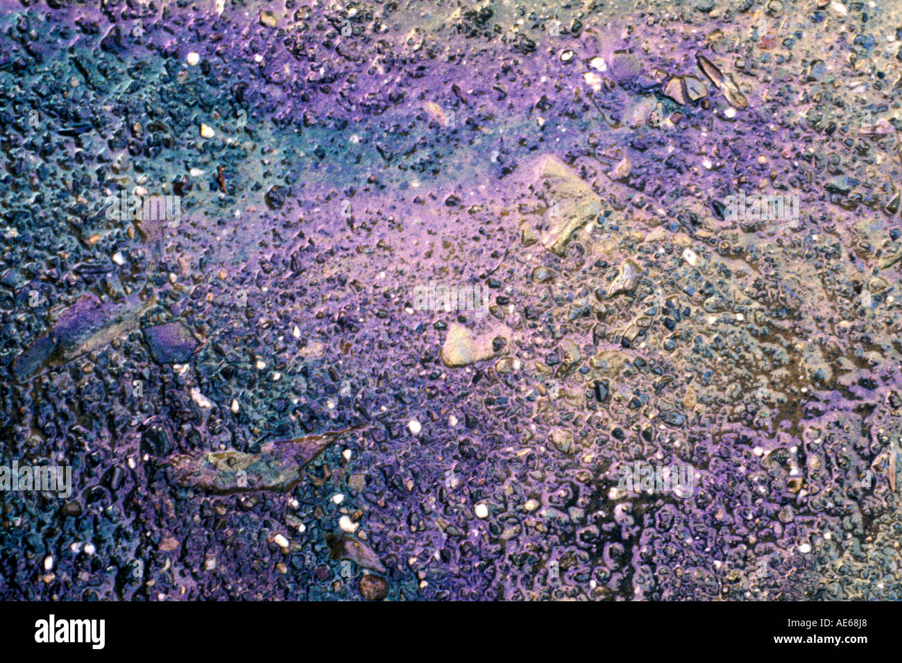 oil spilt on the ground Stock Photo - Alamy