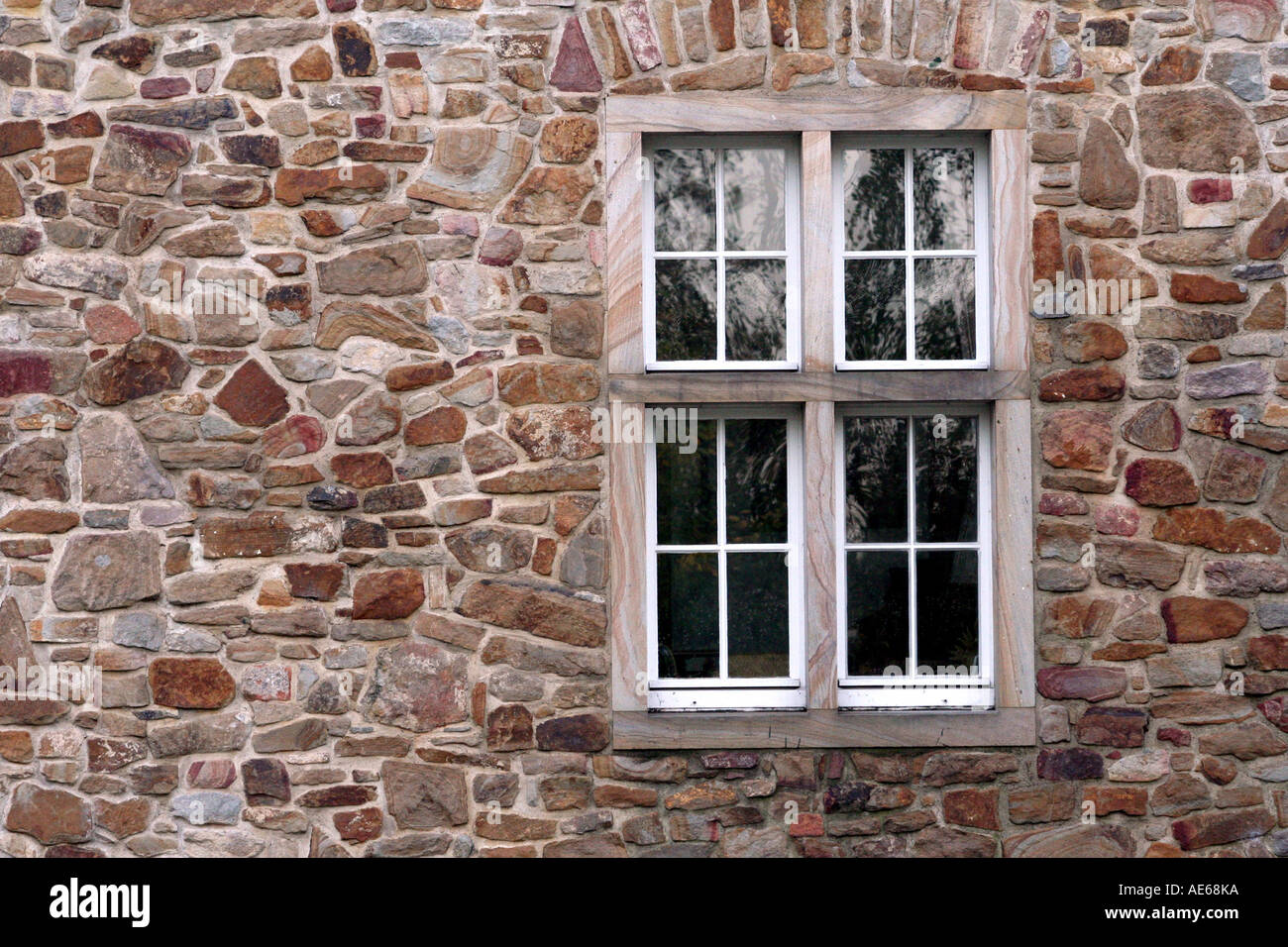 window in a colourful sandstone wall Stock Photo - Alamy