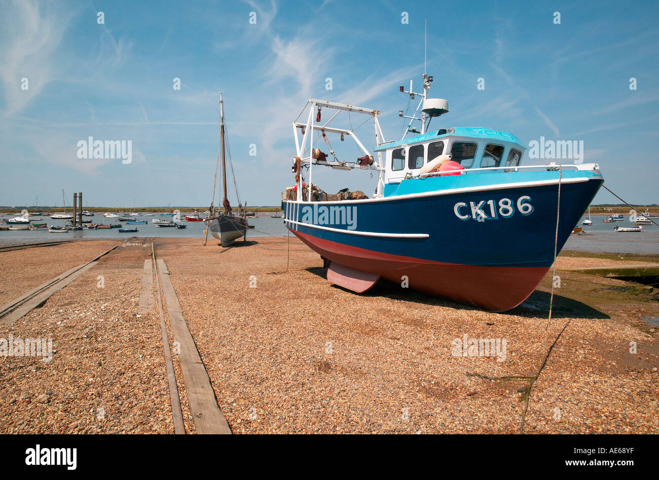 fishing boat seafront mersea island Stock Photo - Alamy