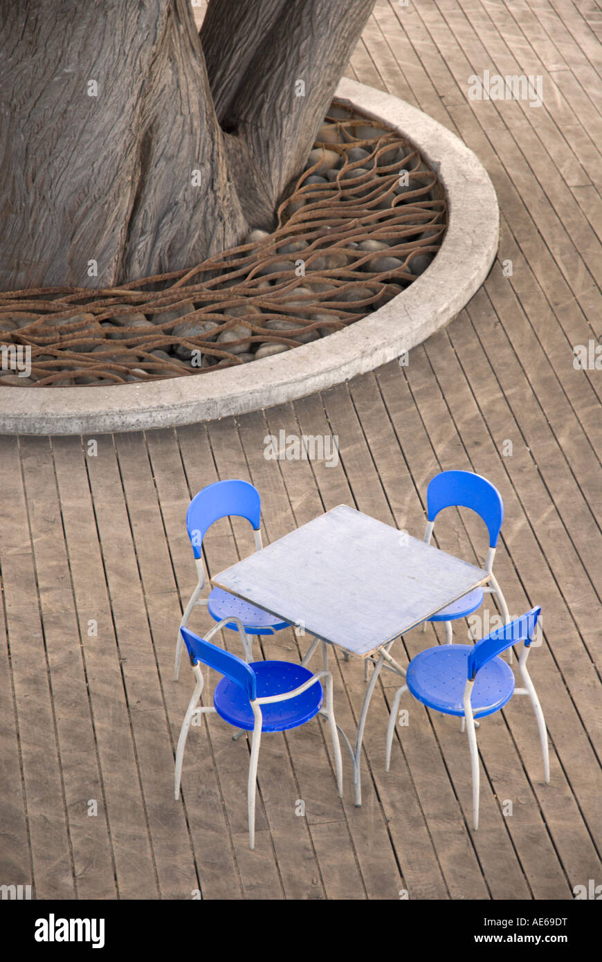 Cafe table and chairs showing contrasting shapes and textures Stock ...