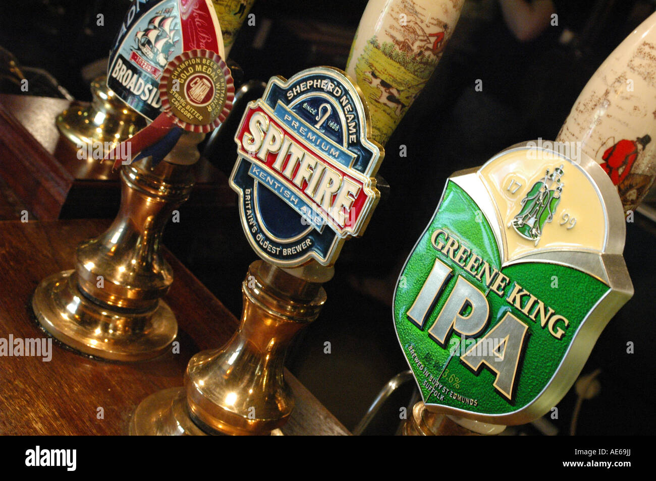 Beer taps in an English pub Stock Photo - Alamy