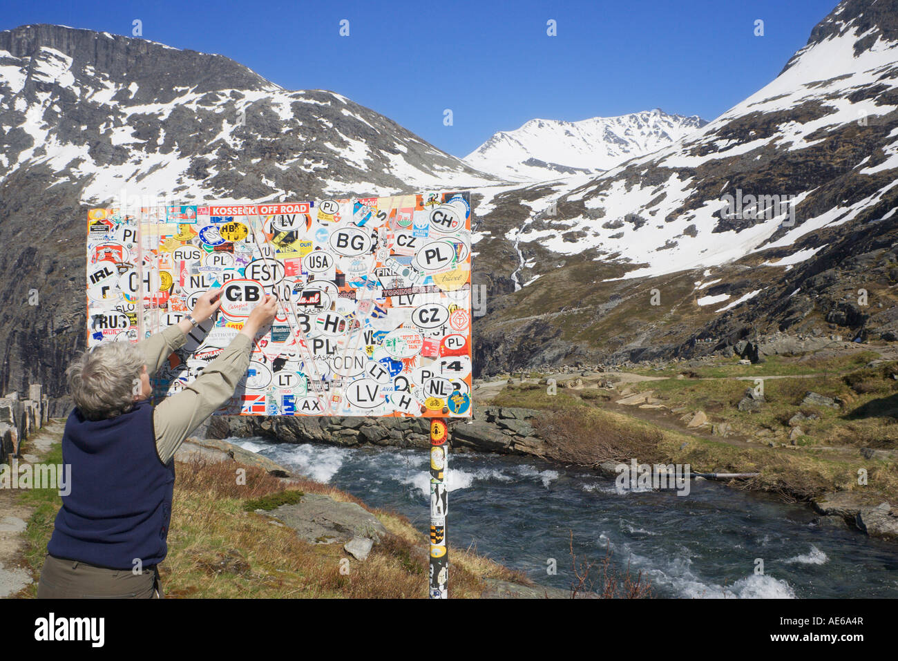 Road sign adding hi-res stock photography and images - Alamy
