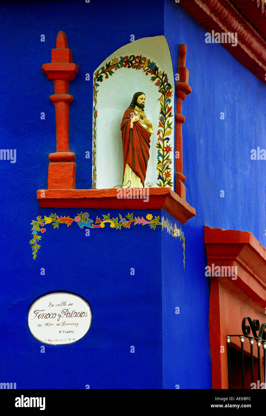 A close cropped image of a Colourful Religious Icon on the corner of a ...