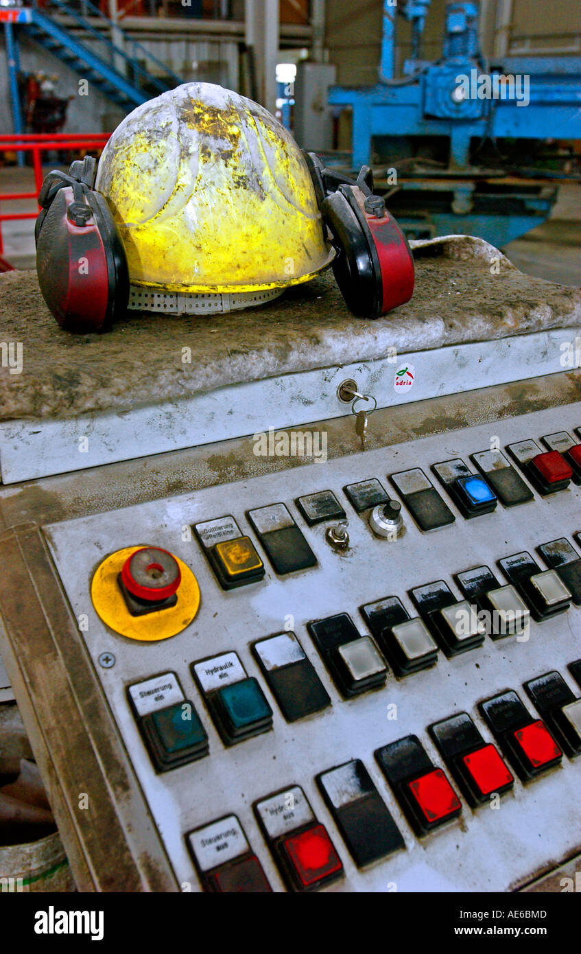 hard hat on control panel Stock Photo - Alamy