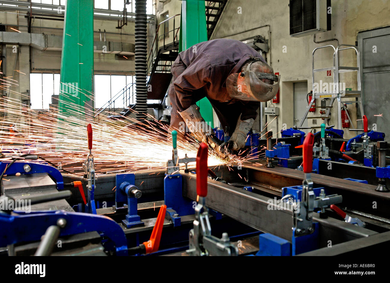 steel building grinding Stock Photo - Alamy