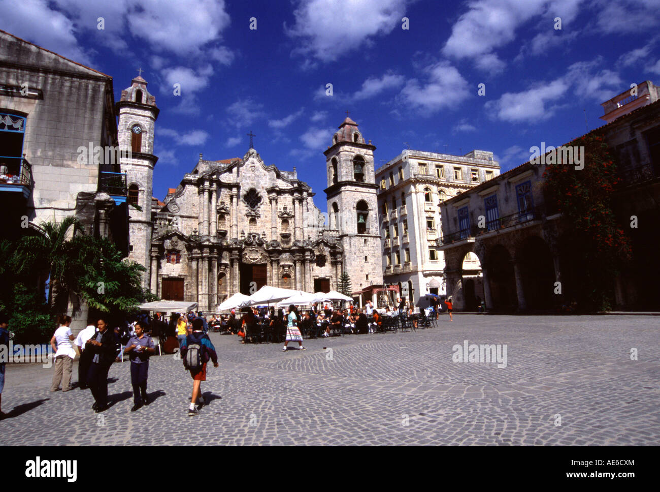 Group of people walking on Cathedral Square The Cathedral of Havana ...