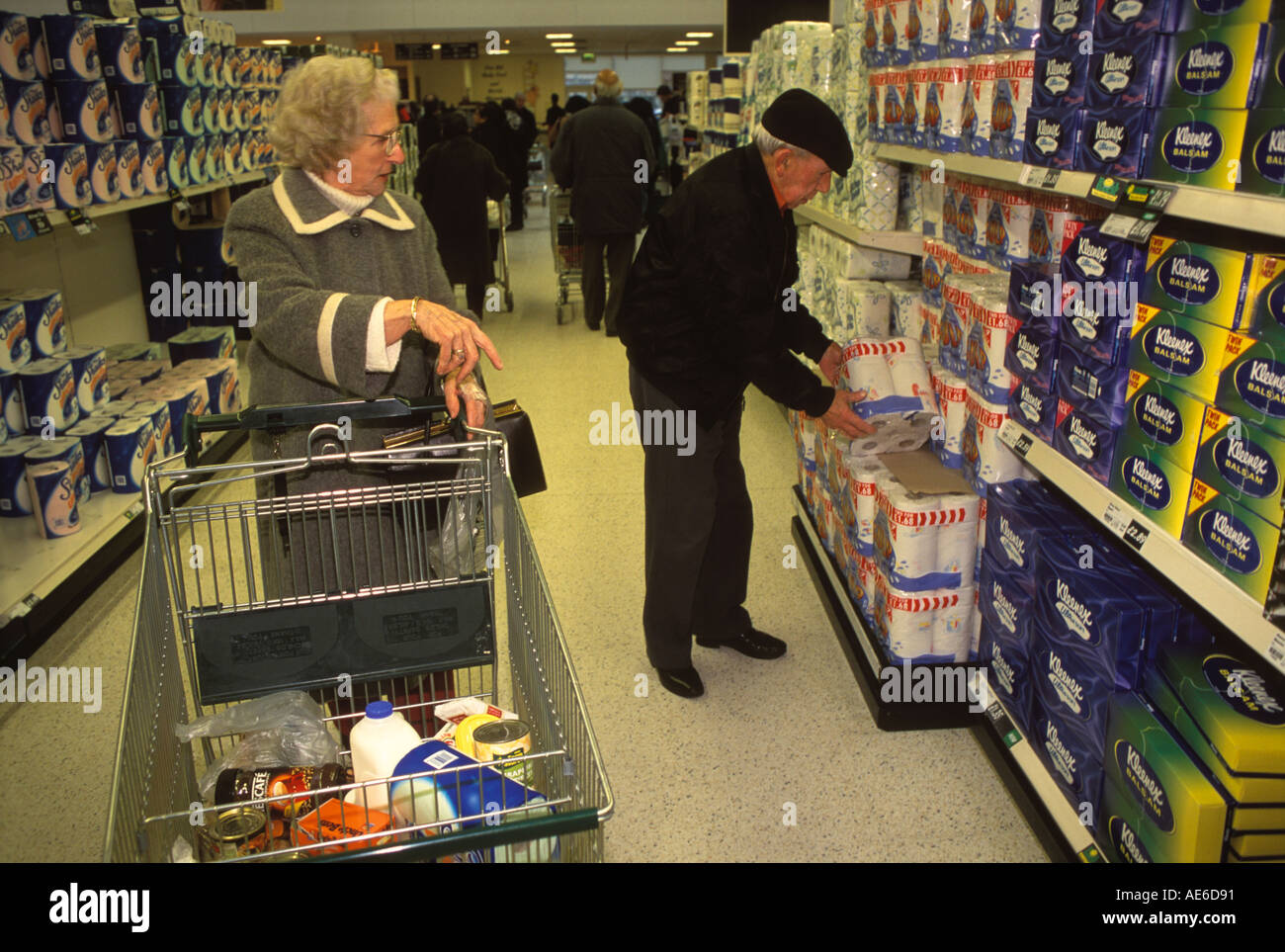Senior couple 1990s UK supermarket shopping London buying weekly ...