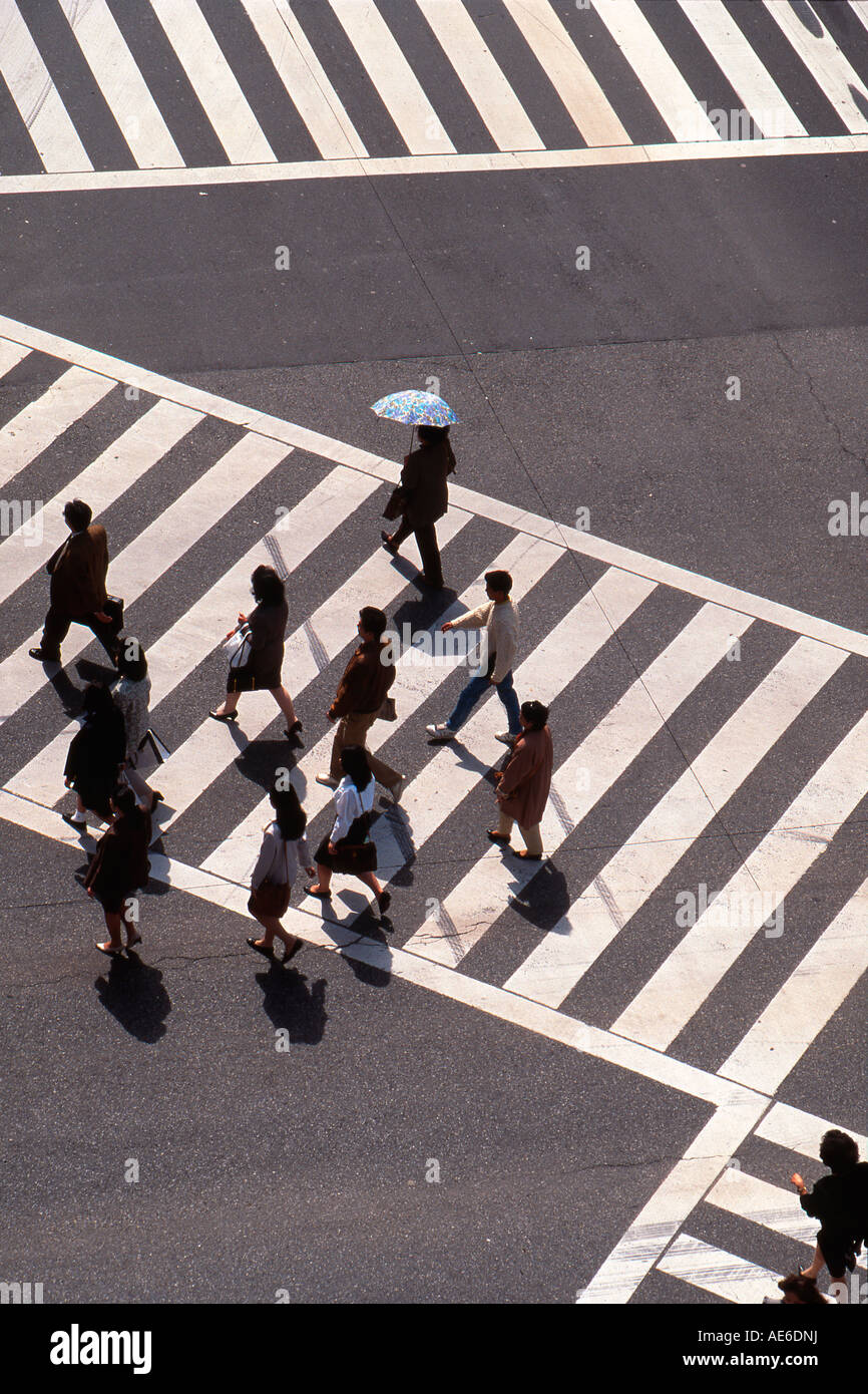 Pedestrians crossing a street Stock Photo - Alamy