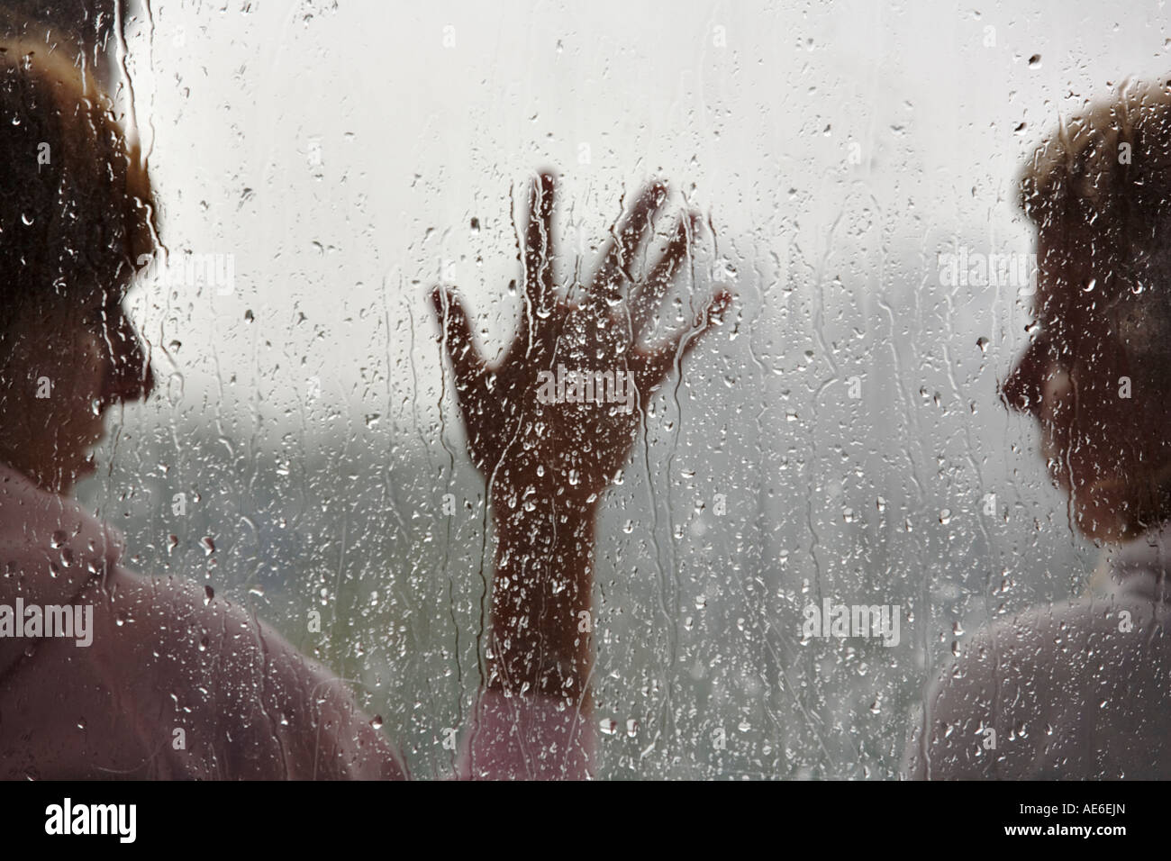 Hand through the window Stock Photo - Alamy