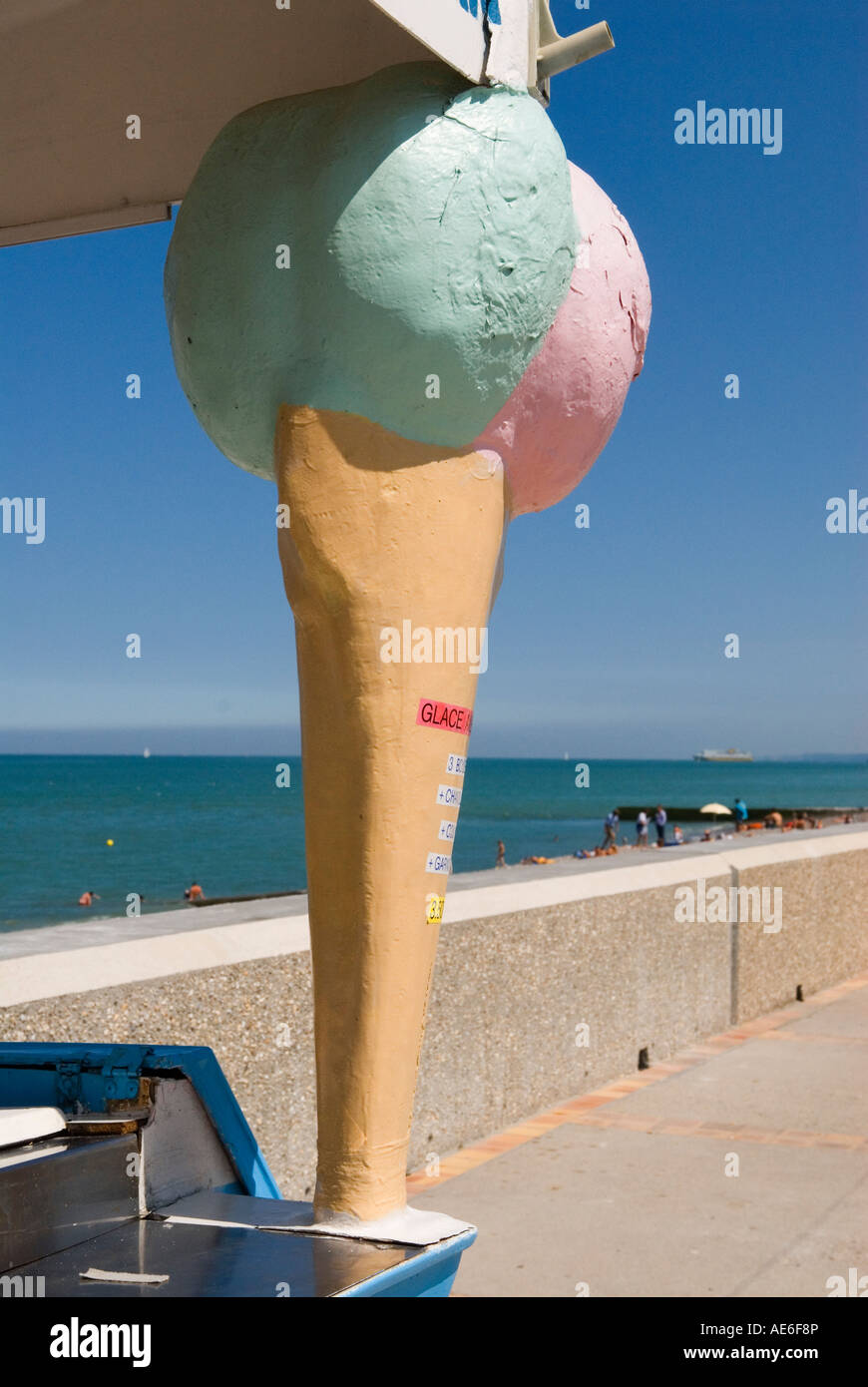 Huge ice cream cone or Glace advertisement on the seafront at Pourville ...