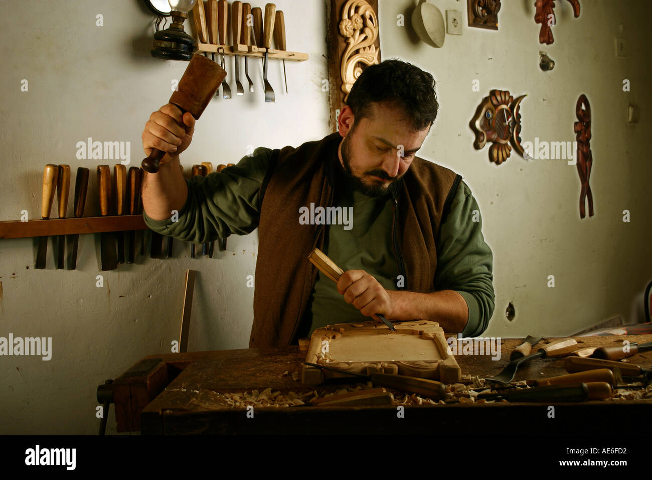 master woodcarver in his workshop Stock Photo - Alamy