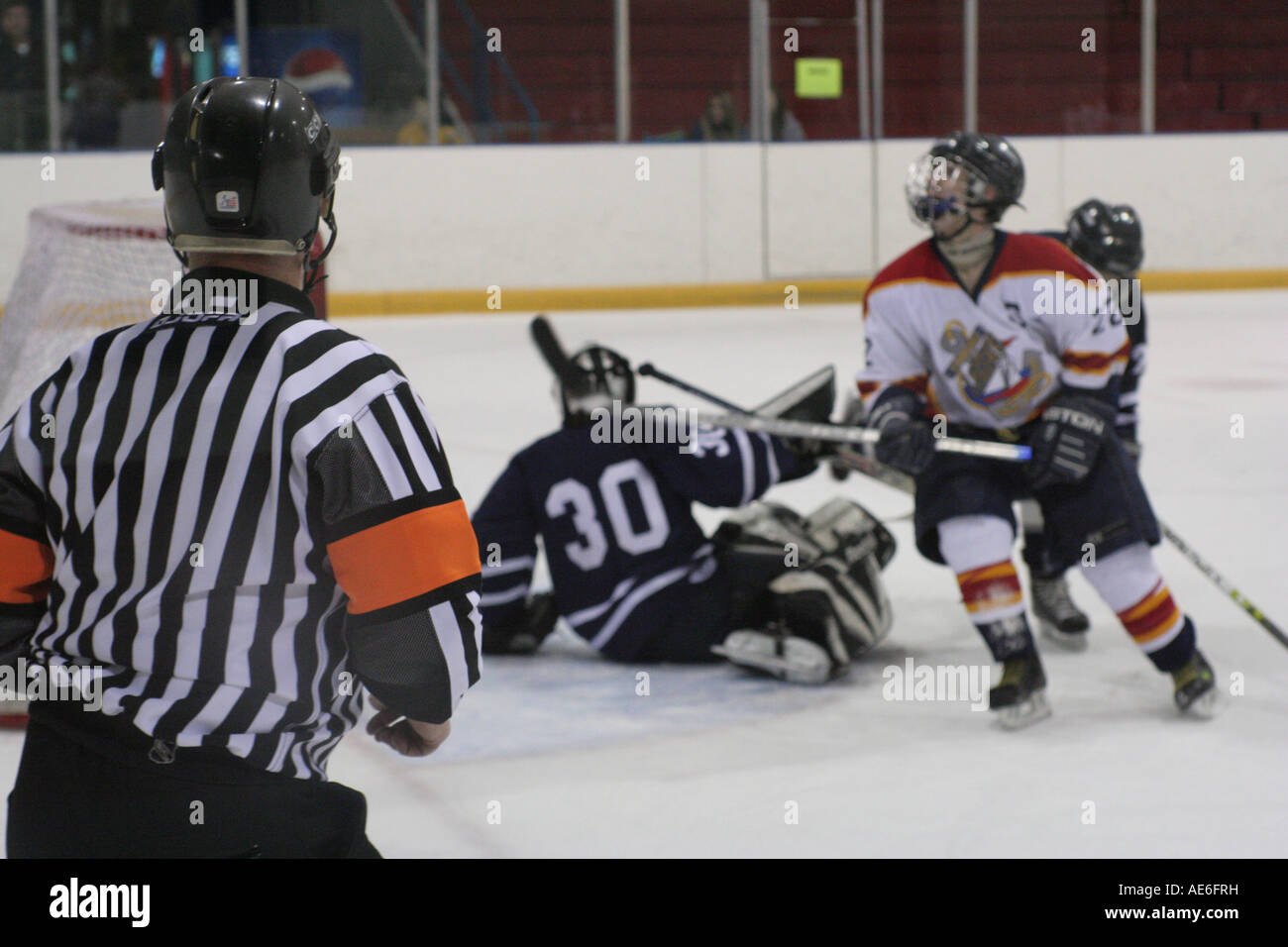 Referee calling an ice hockey game Stock Photo - Alamy