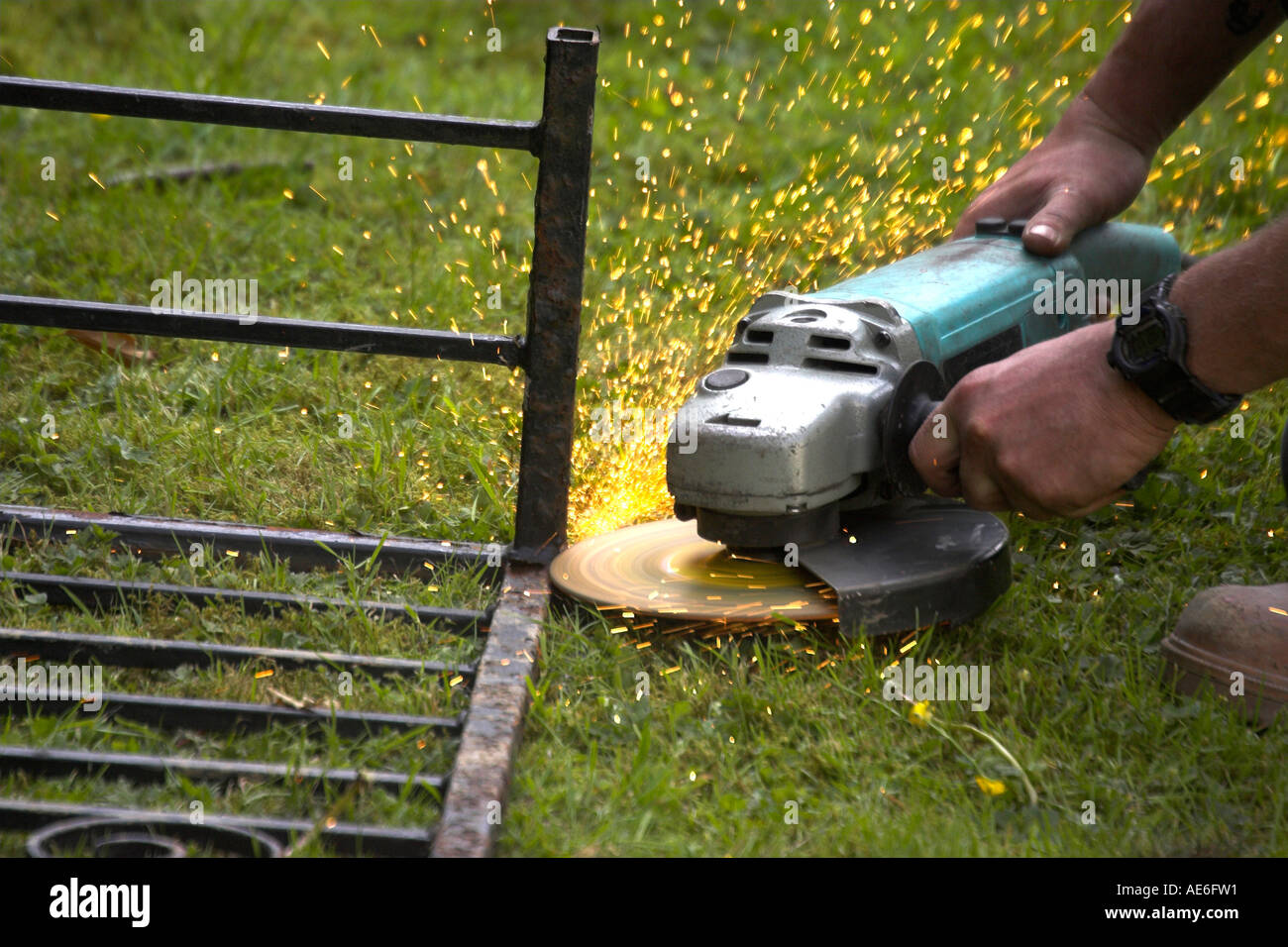 blacksmith welding wrought iron work Stock Photo - Alamy