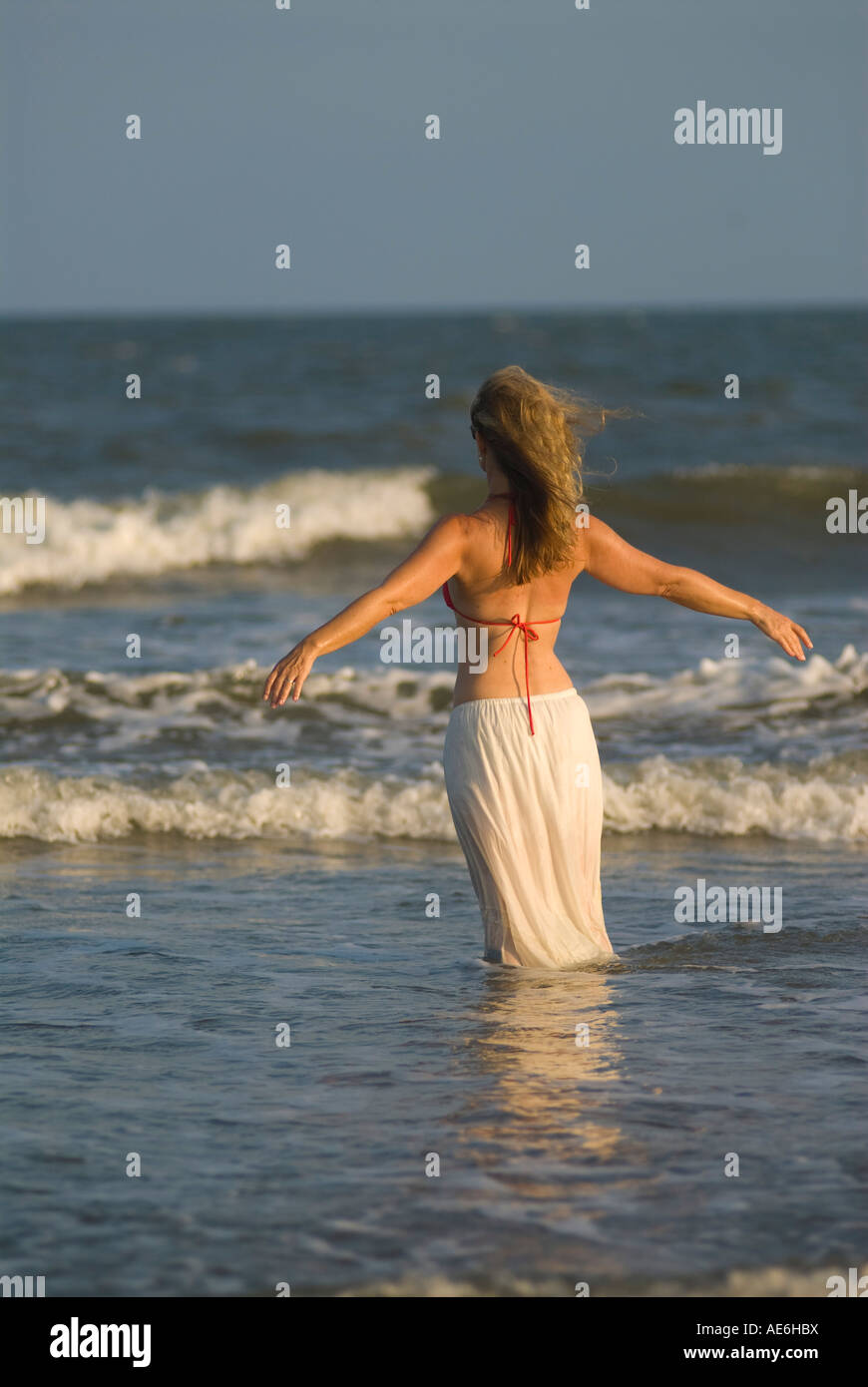 Woman dancing in a bikini hi-res stock photography and images - Alamy