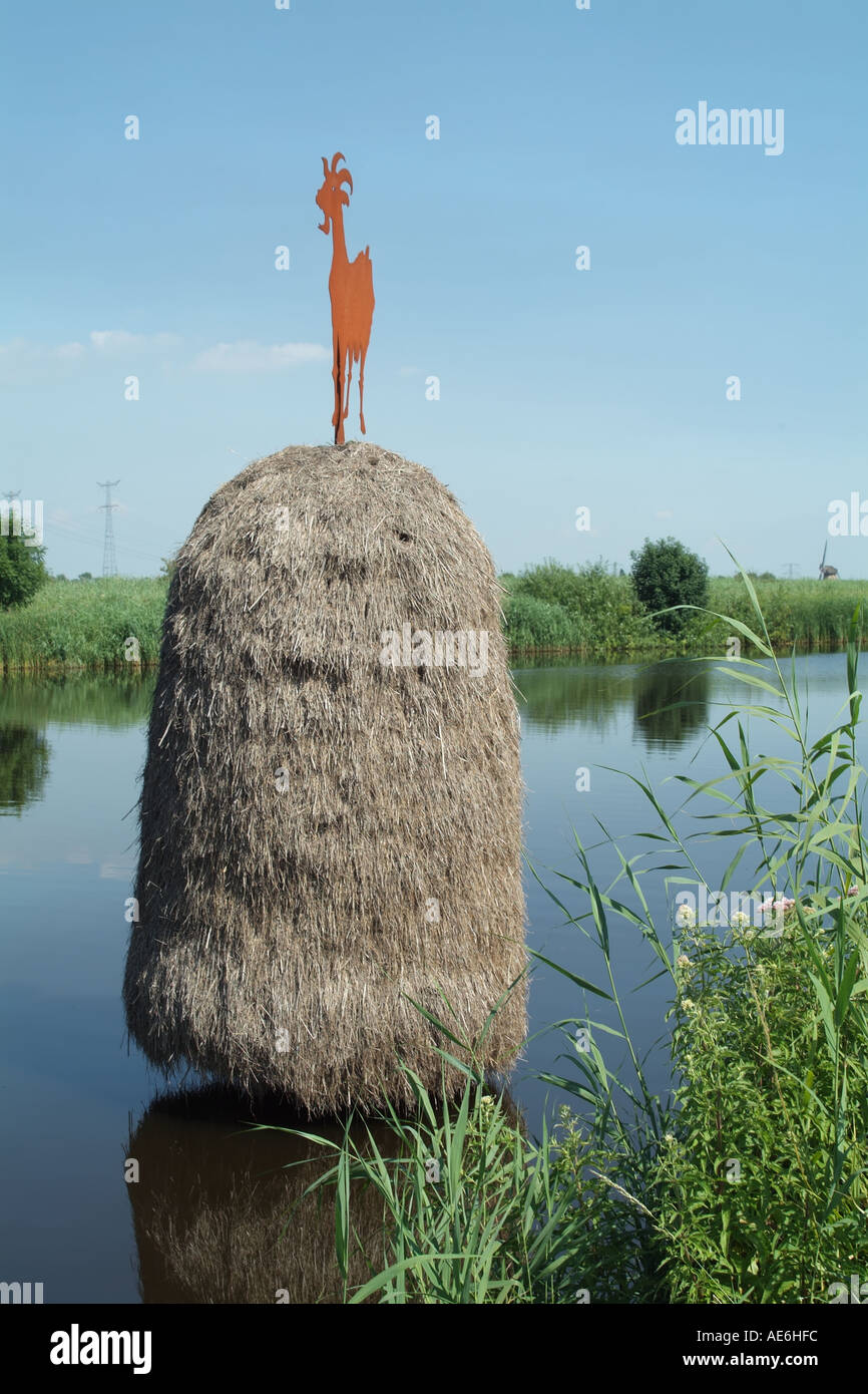 haystack in water at the Kinderdijk World Heritage site Holland The ...