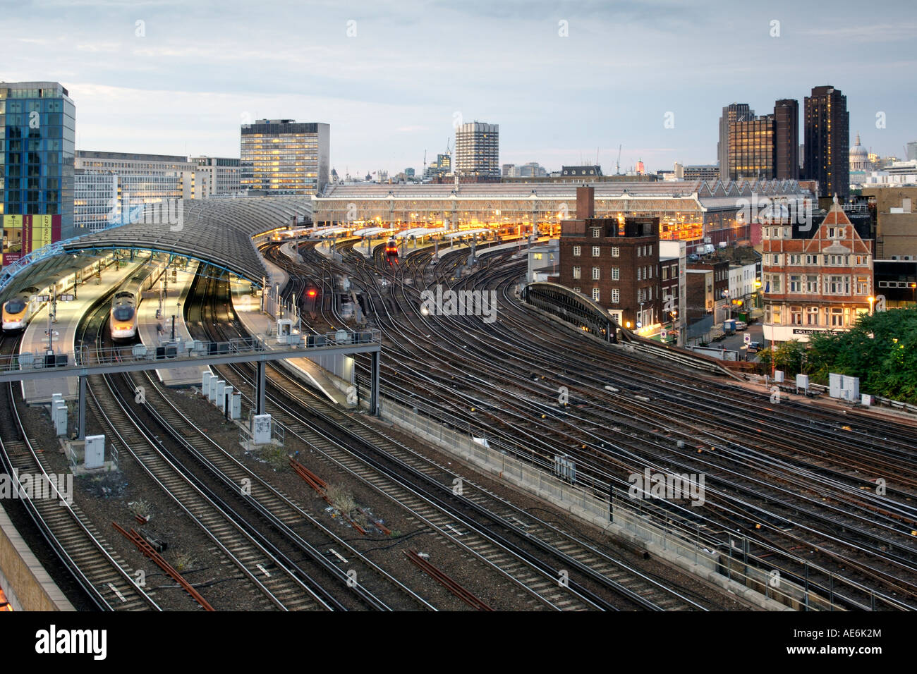 Dusk view of rail tracks leading to London's Waterloo train station ...