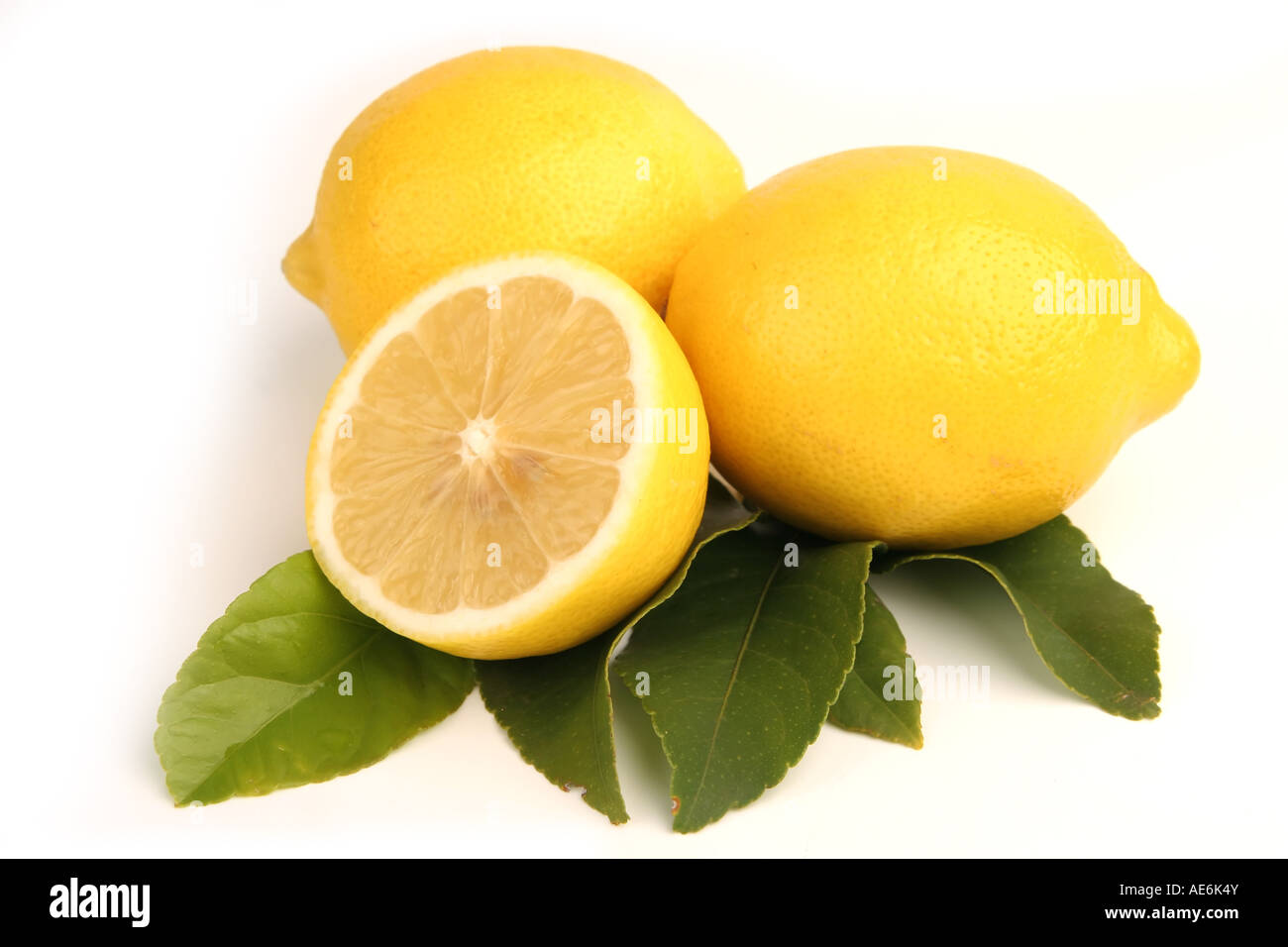 Lemons with leaves Stock Photo - Alamy