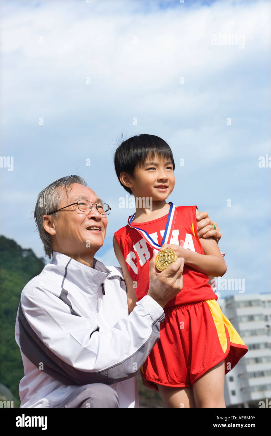 young chinese boy in national athletics kit Stock Photo - Alamy