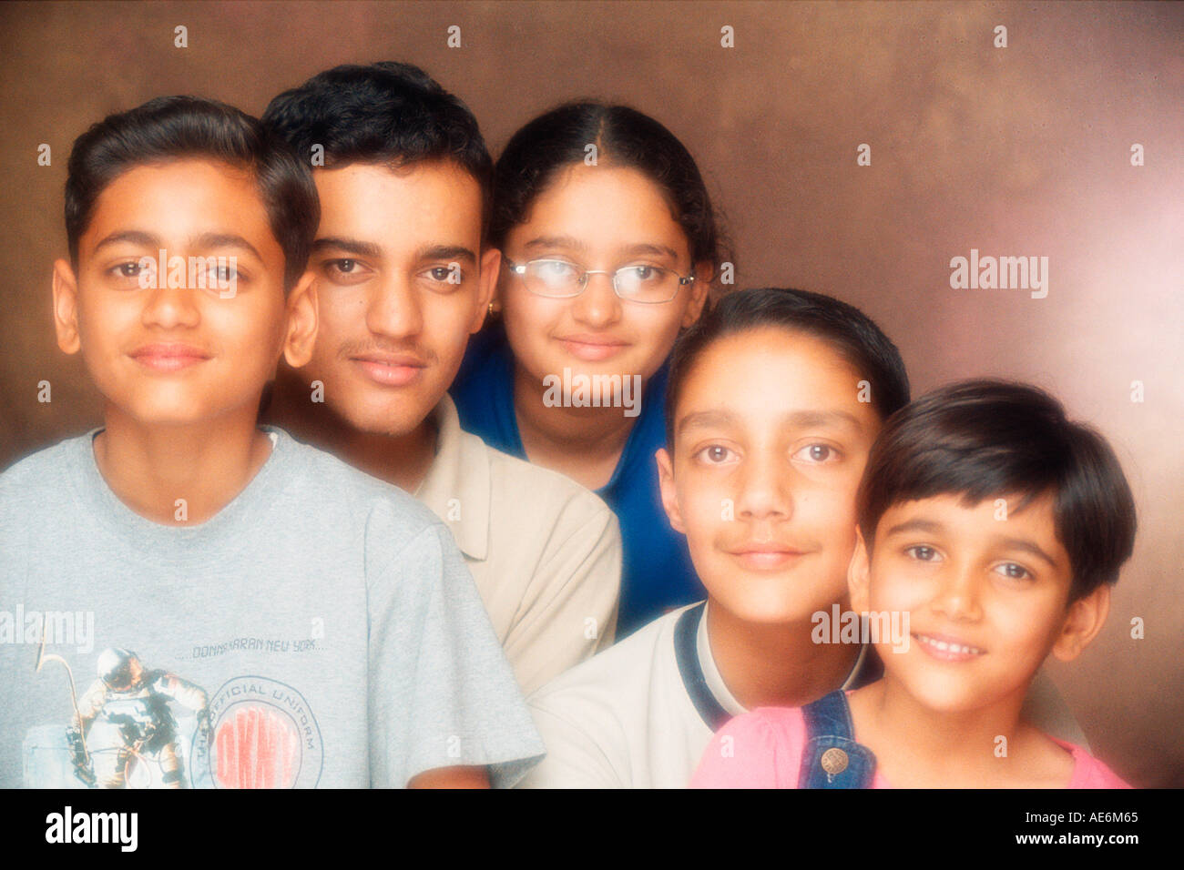 Asian Indian family with four brother and one sister looking to the ...