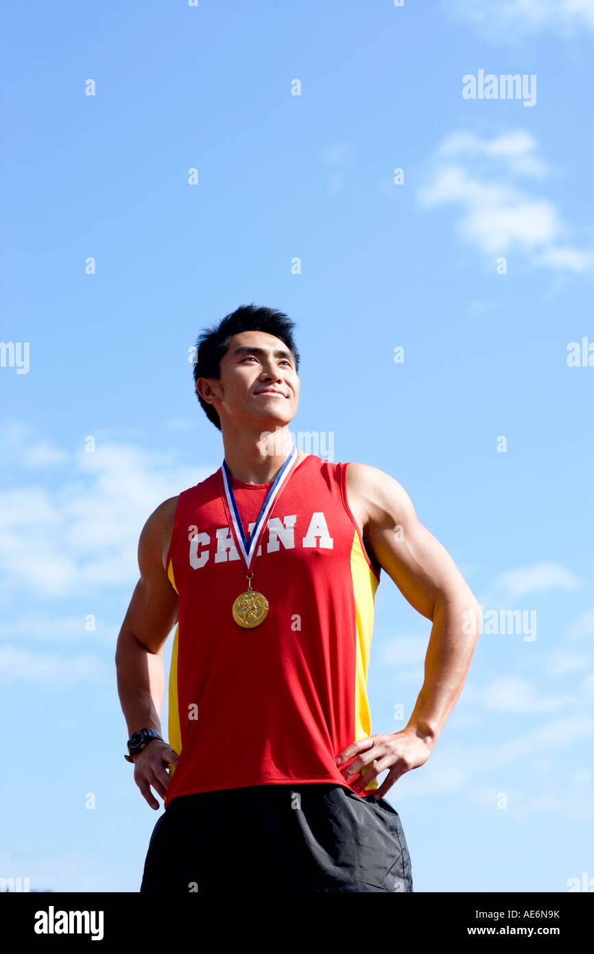 chinese athlete with medal Stock Photo - Alamy