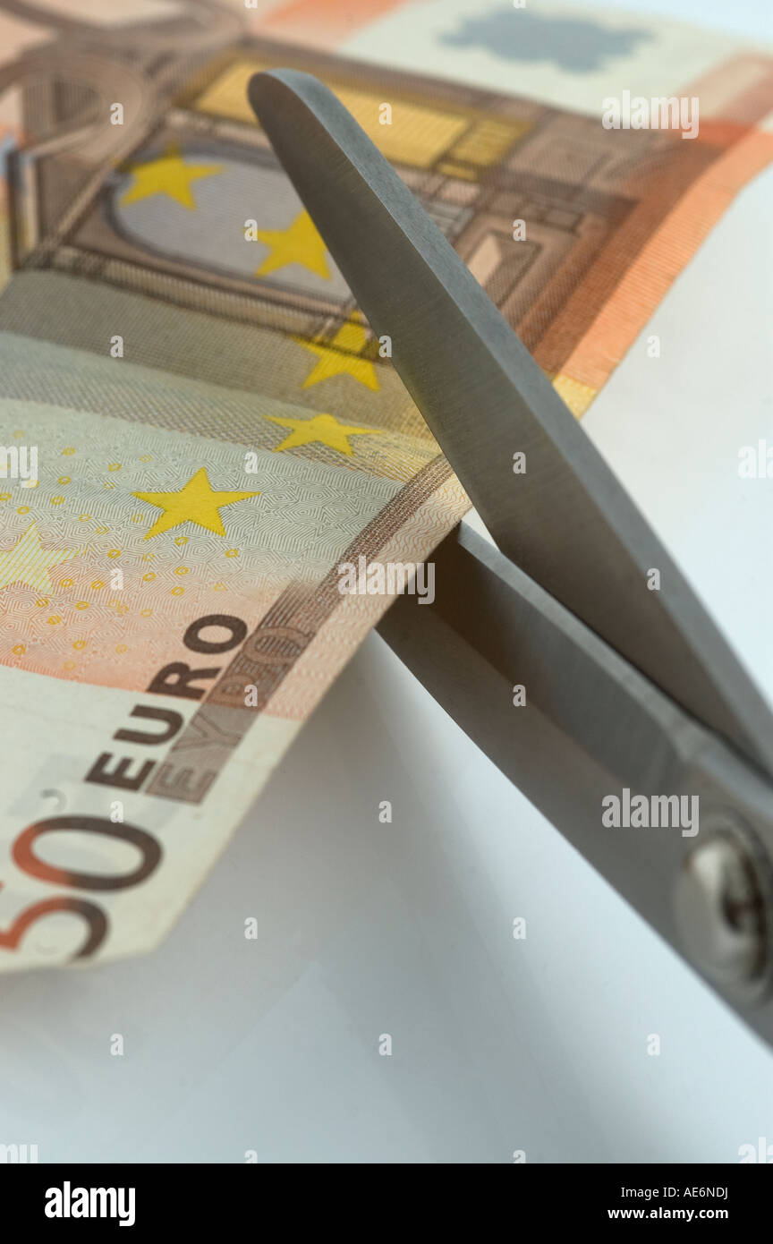 a banknote cutting by scissors Stock Photo - Alamy