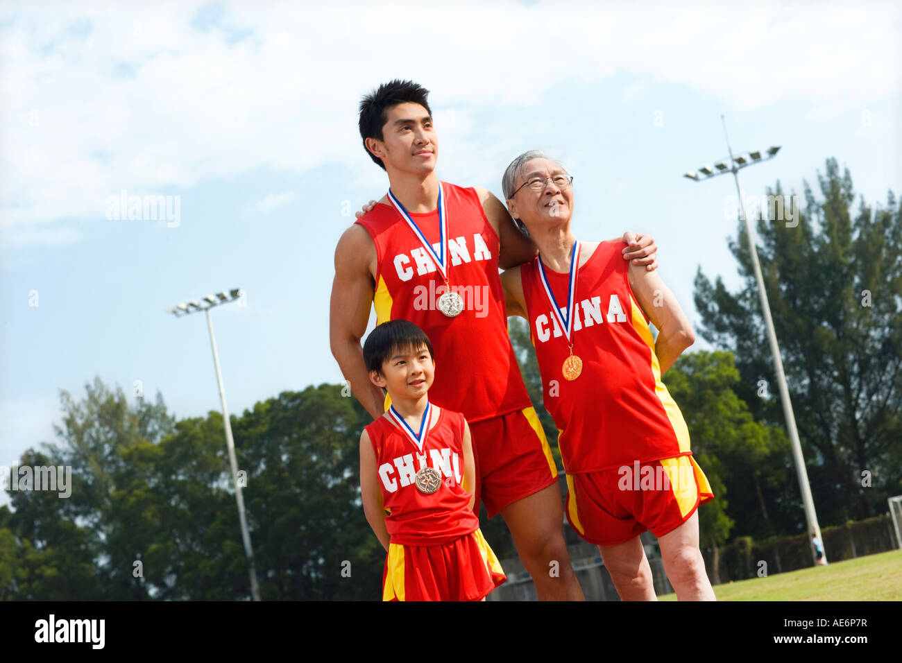 three generations of chinese athlete Stock Photo - Alamy