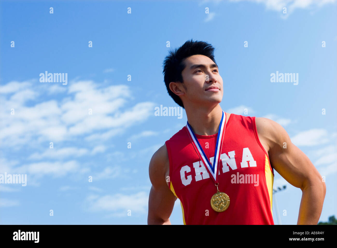 chinese athlete with medal Stock Photo - Alamy