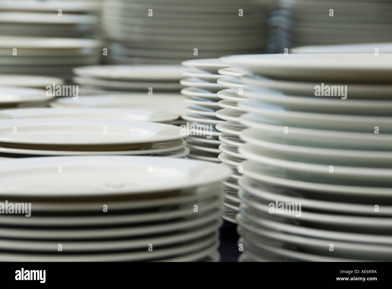 Image of Stacked White Plates Stock Photo - Alamy