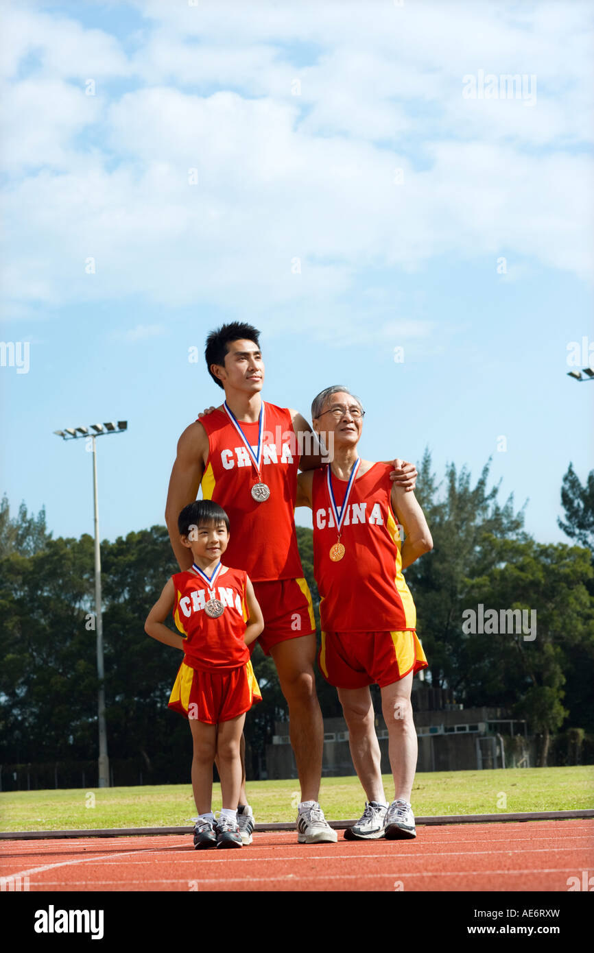 three generations of chinese athlete Stock Photo - Alamy
