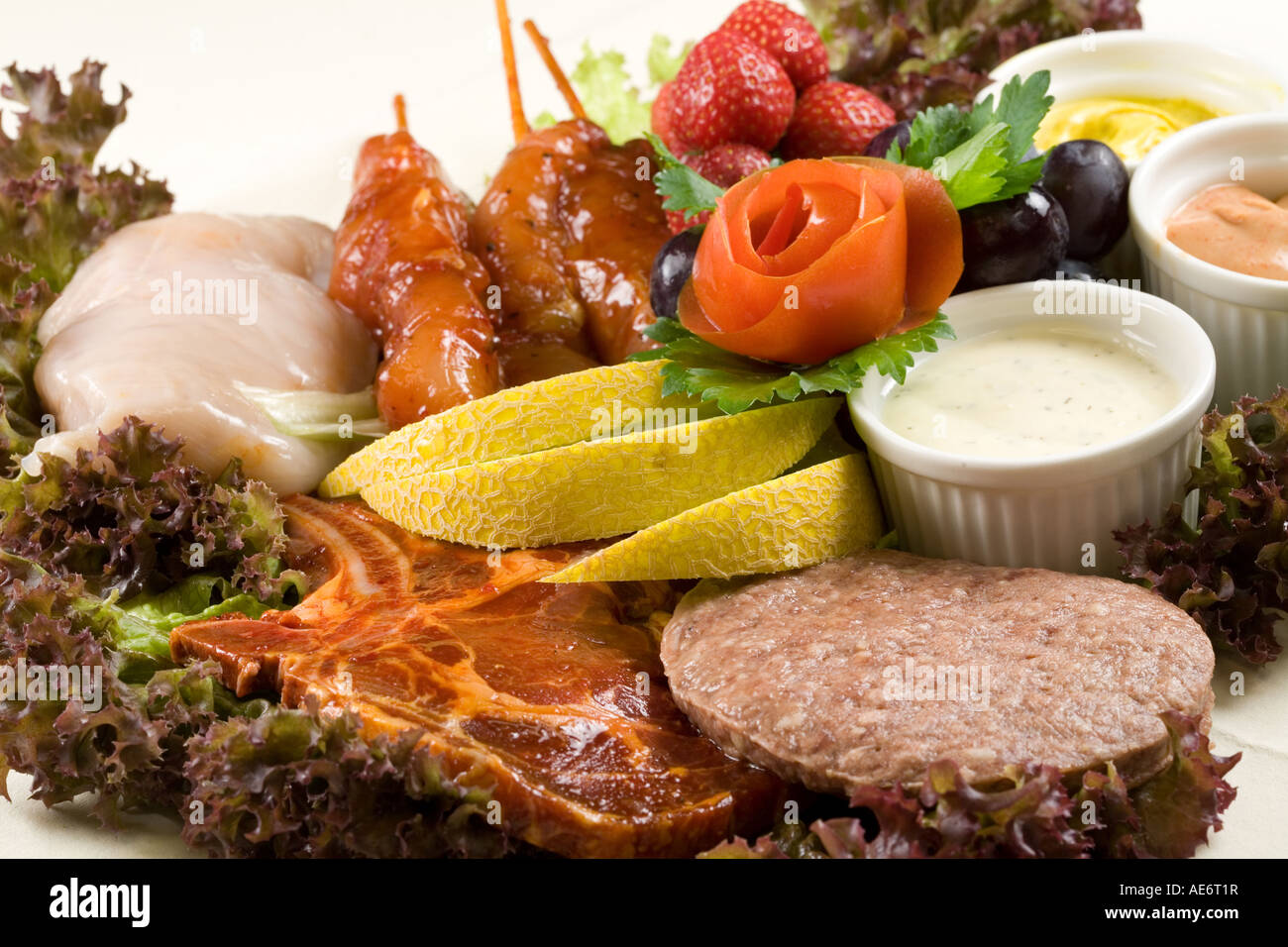 Delicious plate full of marinated meat ready for the BBQ Stock Photo ...